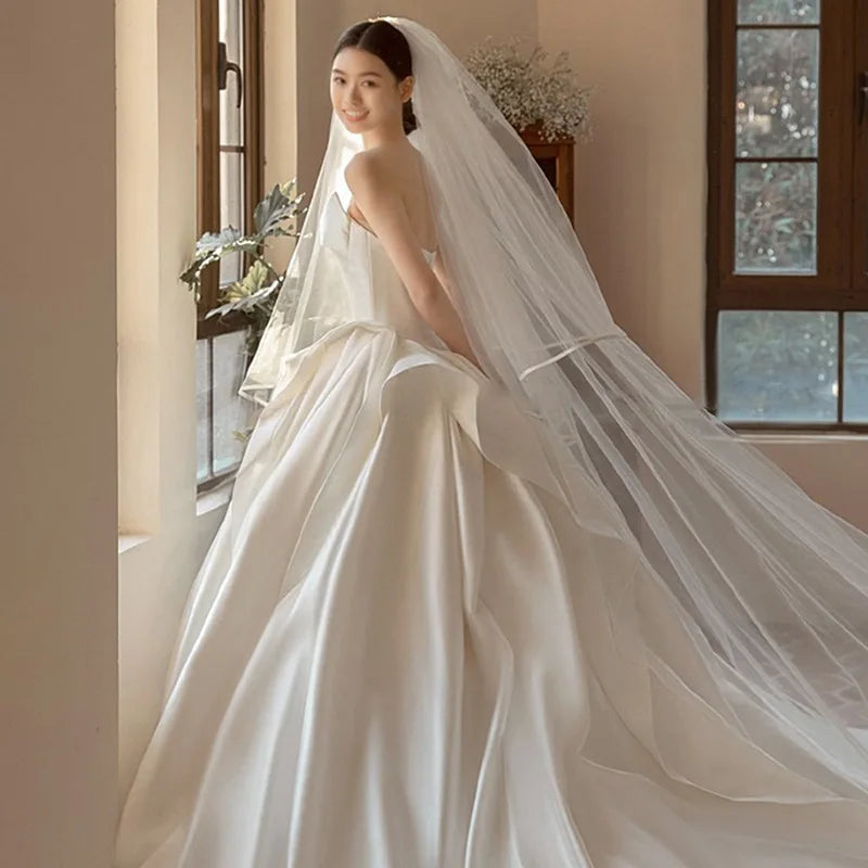 Elegant Satin Bridal Gown With Long Veil on Luulla